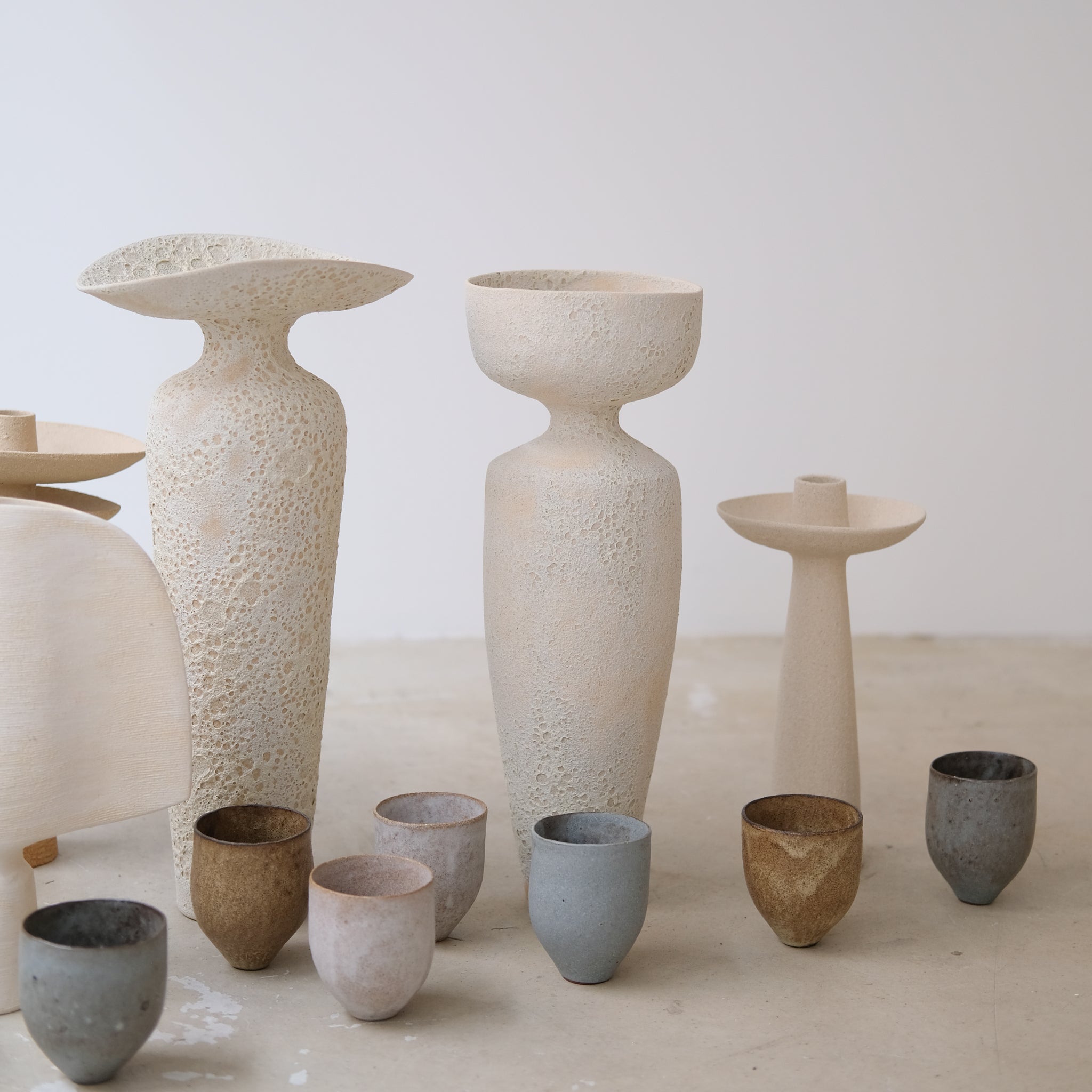 Candlestick in beige sandstone H 25cm by Sophie Vaidie at Brutal Ceramics