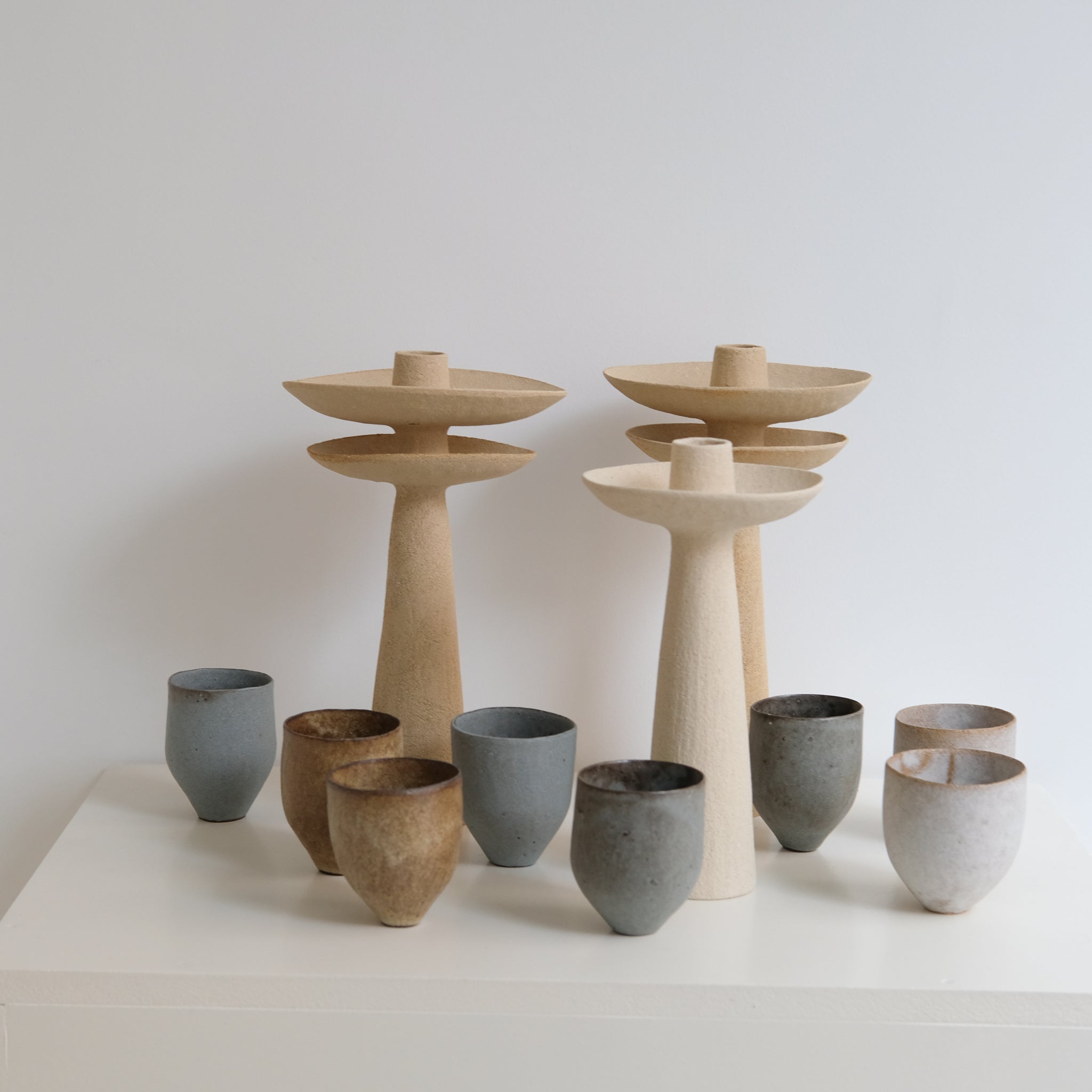 Candlestick in beige sandstone H 25cm by Sophie Vaidie at Brutal Ceramics